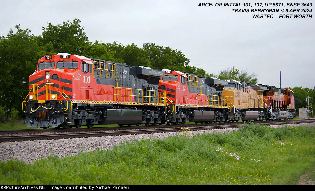 ArcelorMittal ES44AC's 101 and 102, UP AC4400CWM 5871 and BNSF ET44AC 3643